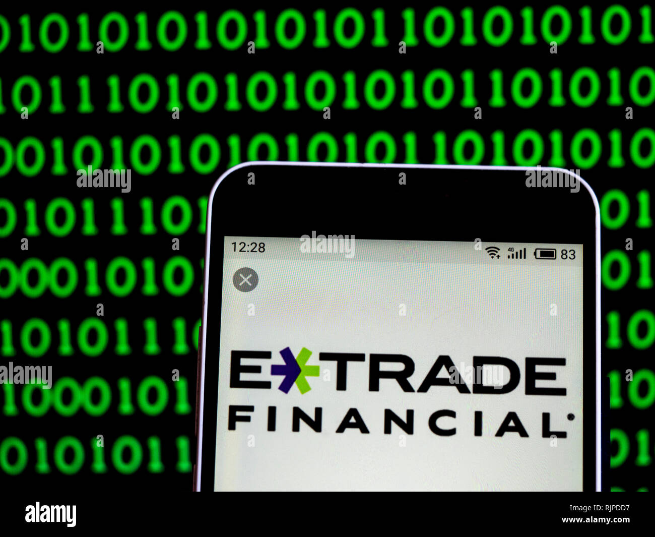 E-Trade Financial services company logo seen displayed on smart phone ...