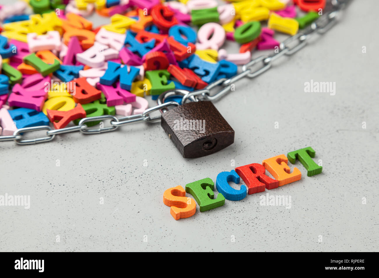 Secret Information. Letters of information symbol wrapped in chain and ...
