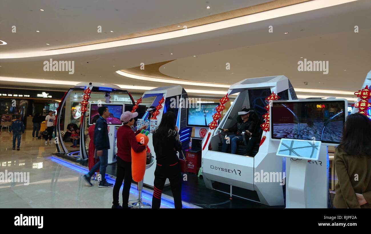 Shenzhen, China: people experience virtual reality toys Stock Photo - Alamy