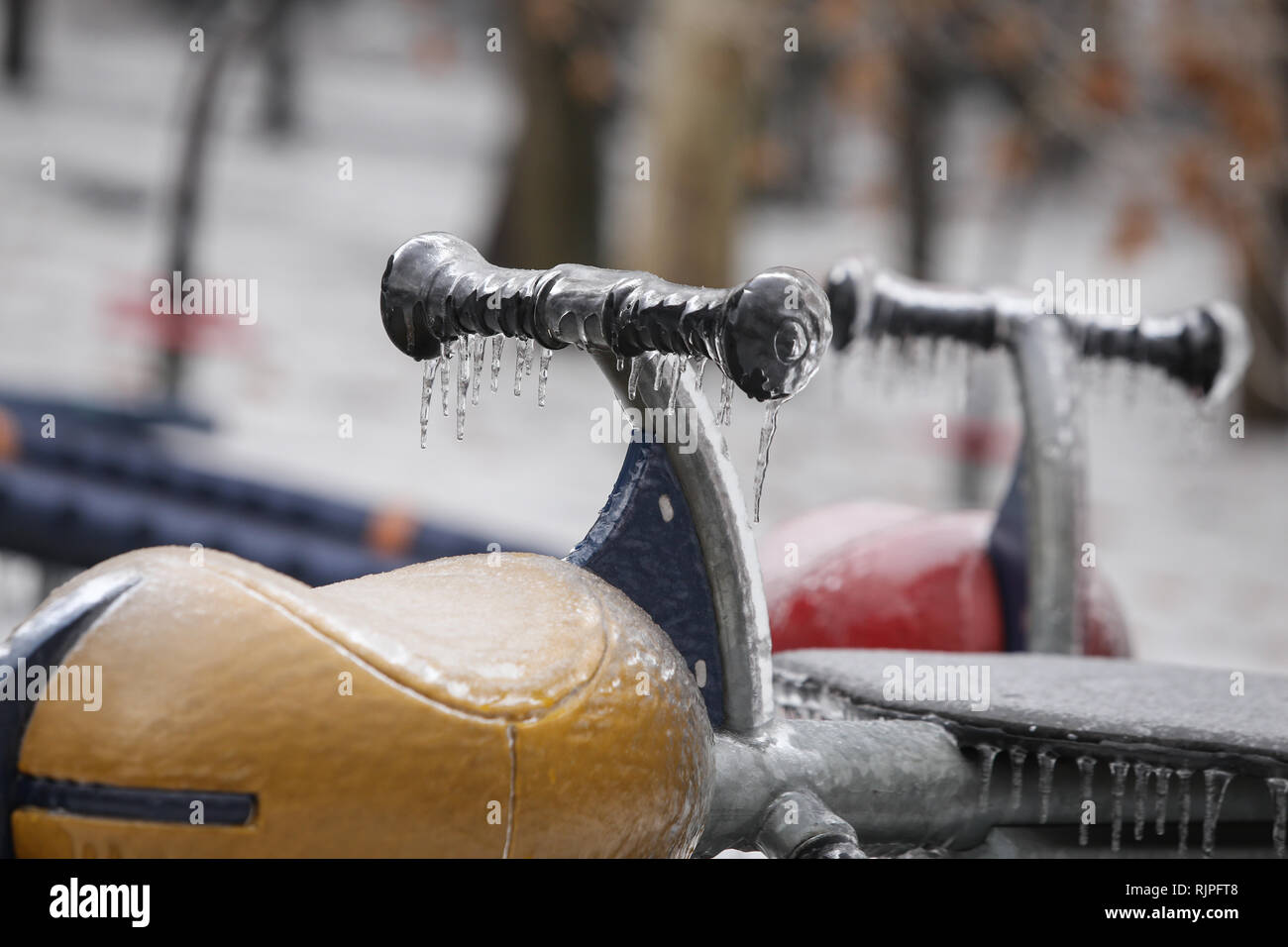 Frozen children playground after a freezing rain weather phenomenon ...