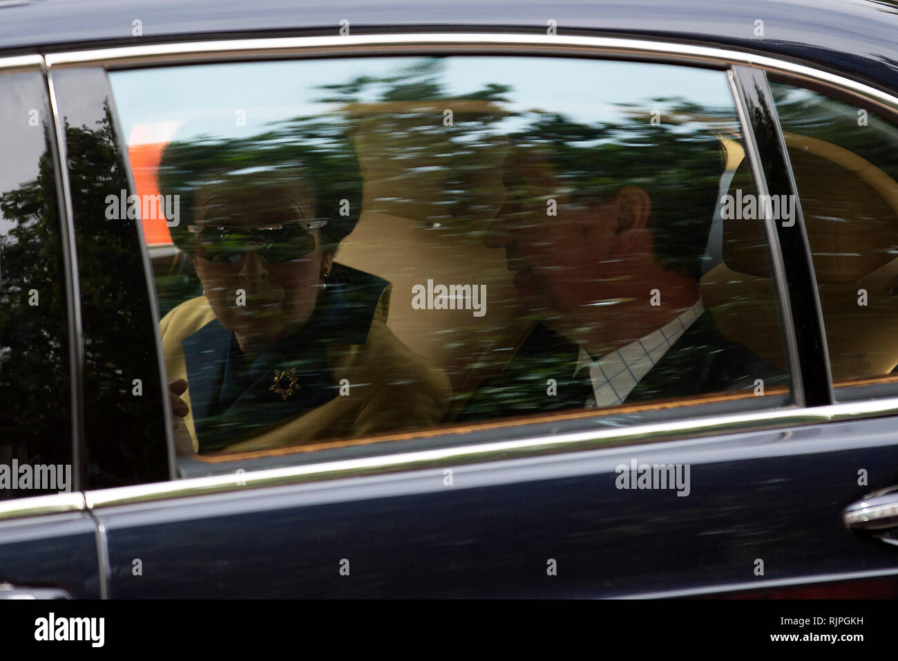 Princess Anne is driven through central London by police motorcycle ...