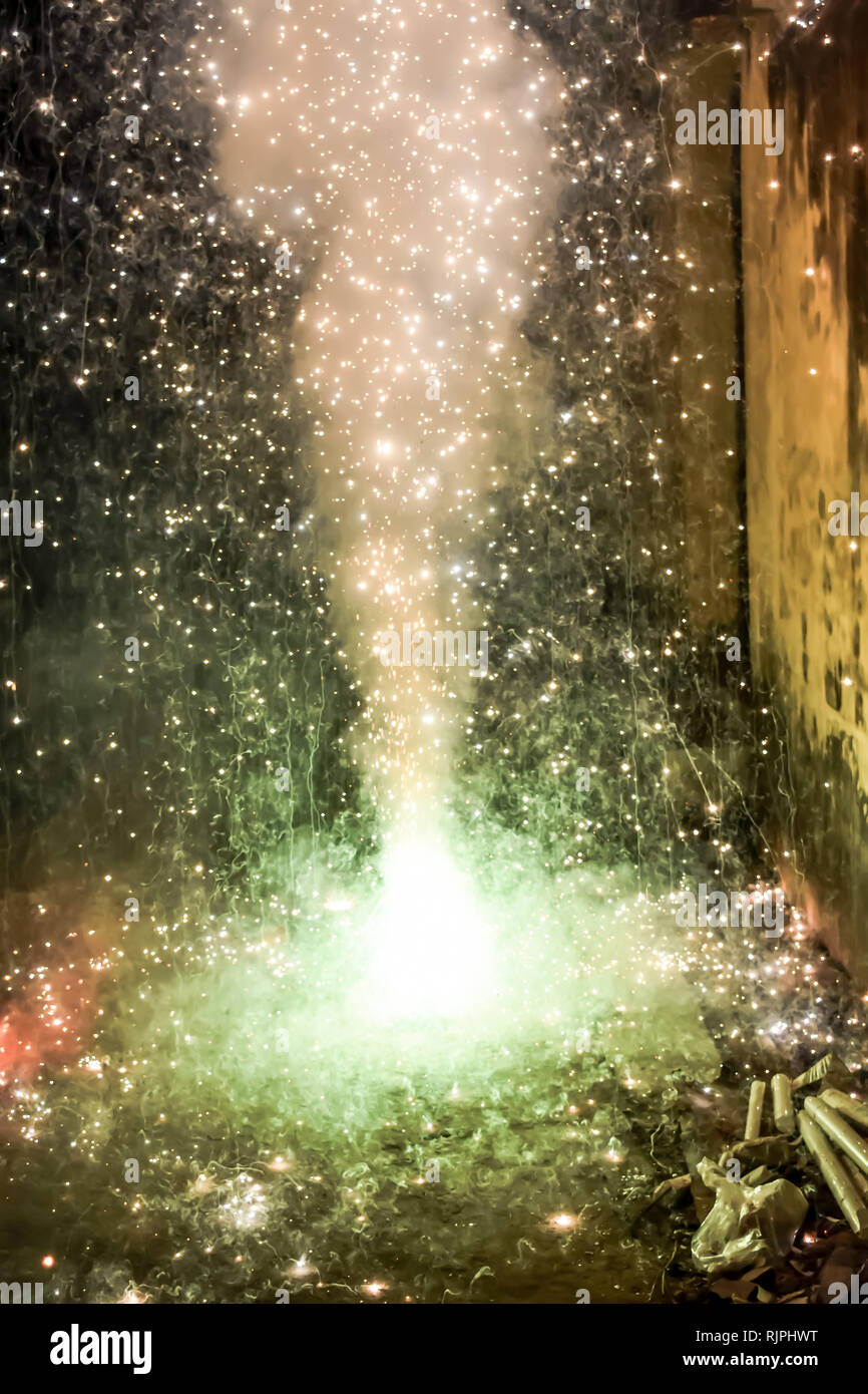 Fire and smoke after fire crackers got fire with a black background ...