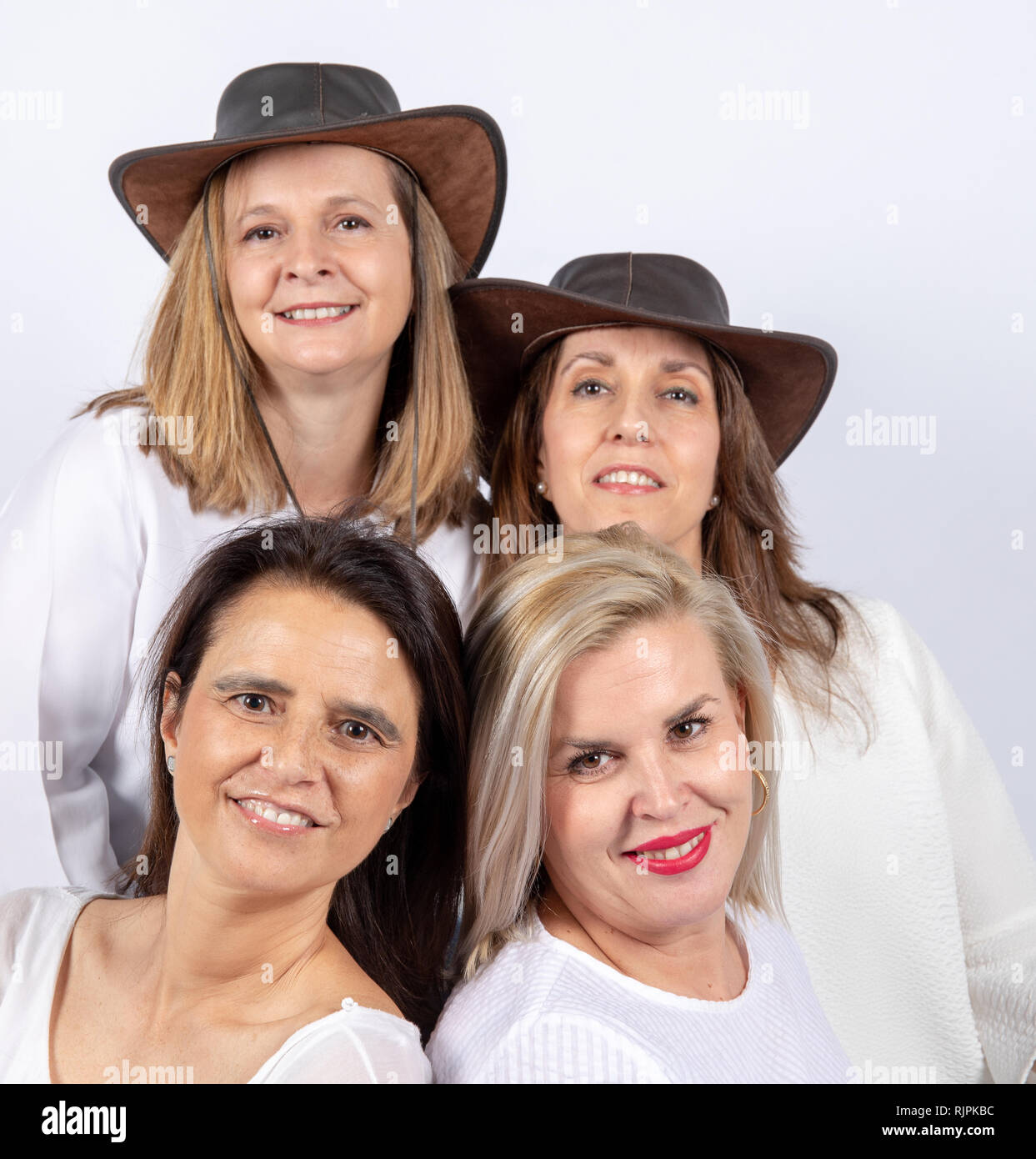 Group of 4 women, friends, middle-aged having fun in a photo session in ...