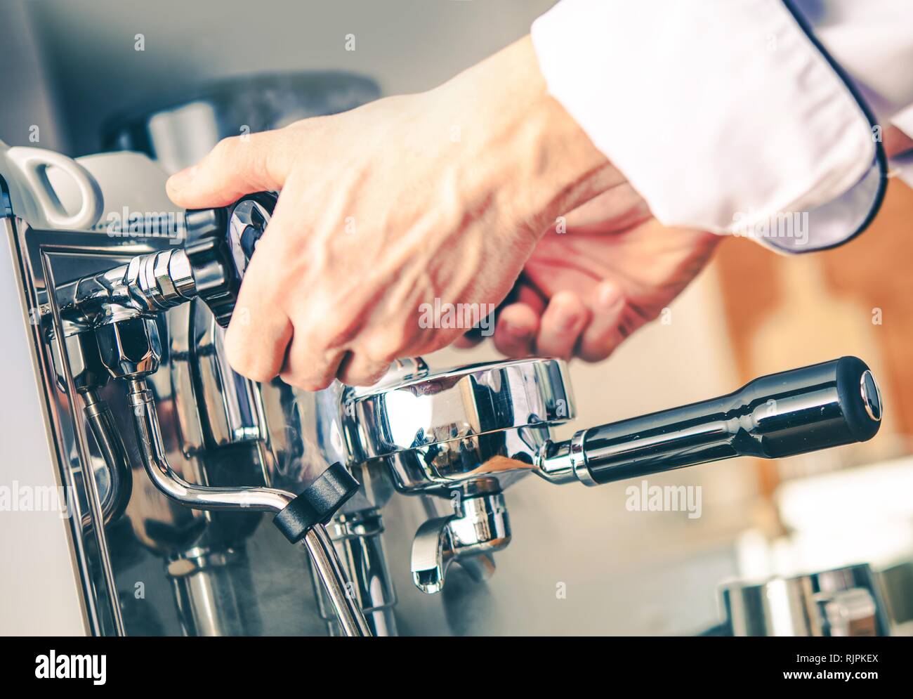 Barista Making Fresh Espresso Coffee Using Classic Style Coffee Maker ...