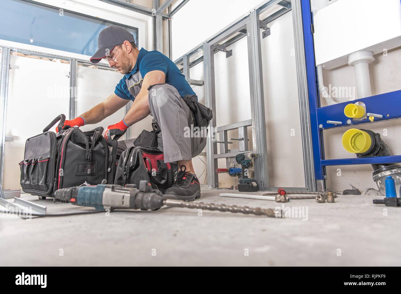 Interior Remodeling Work. Caucasian Construction Worker In His 30s ...