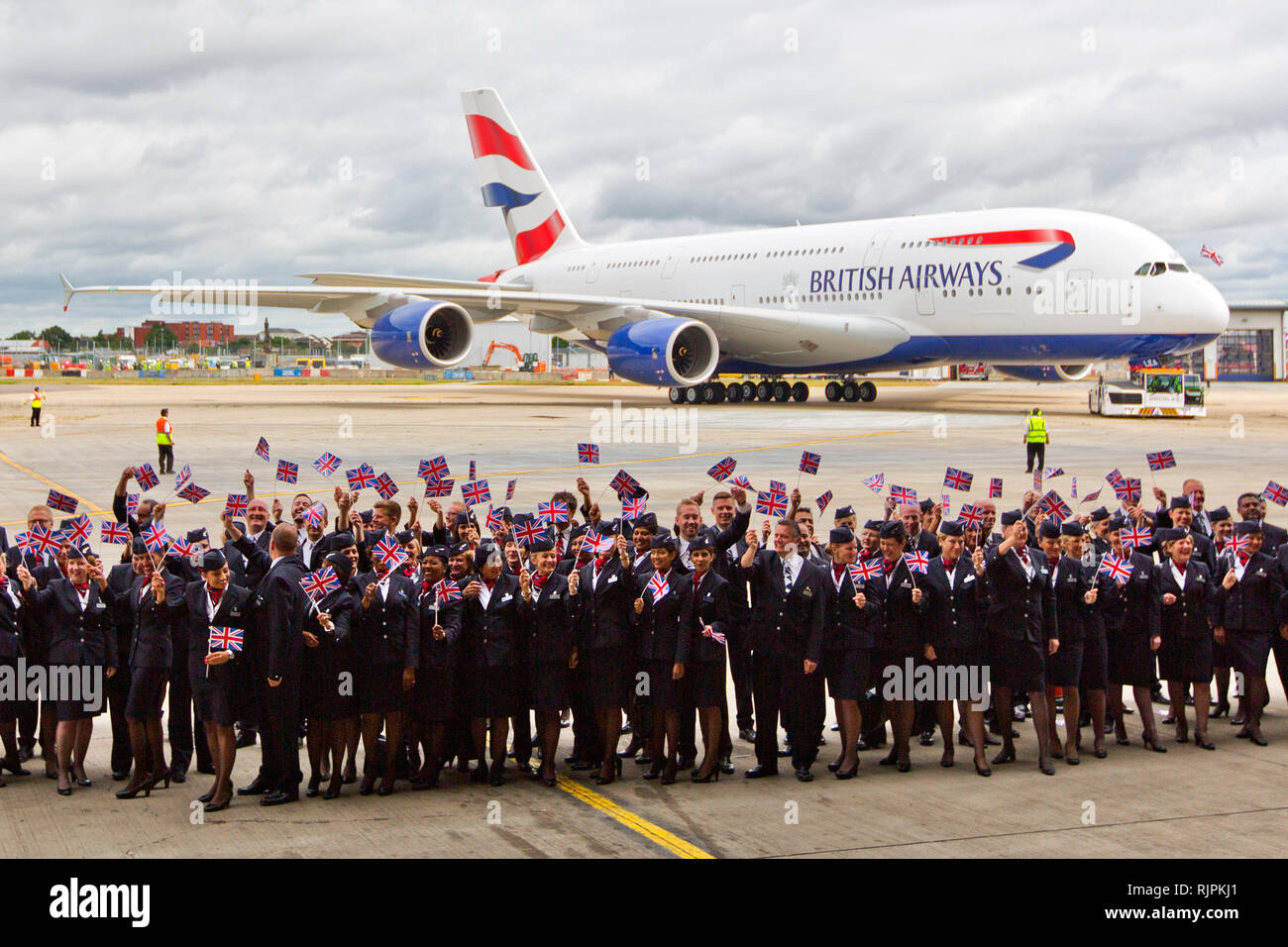 BA staff greet the airline's first Airbus A380 at Heathrow Airport ...