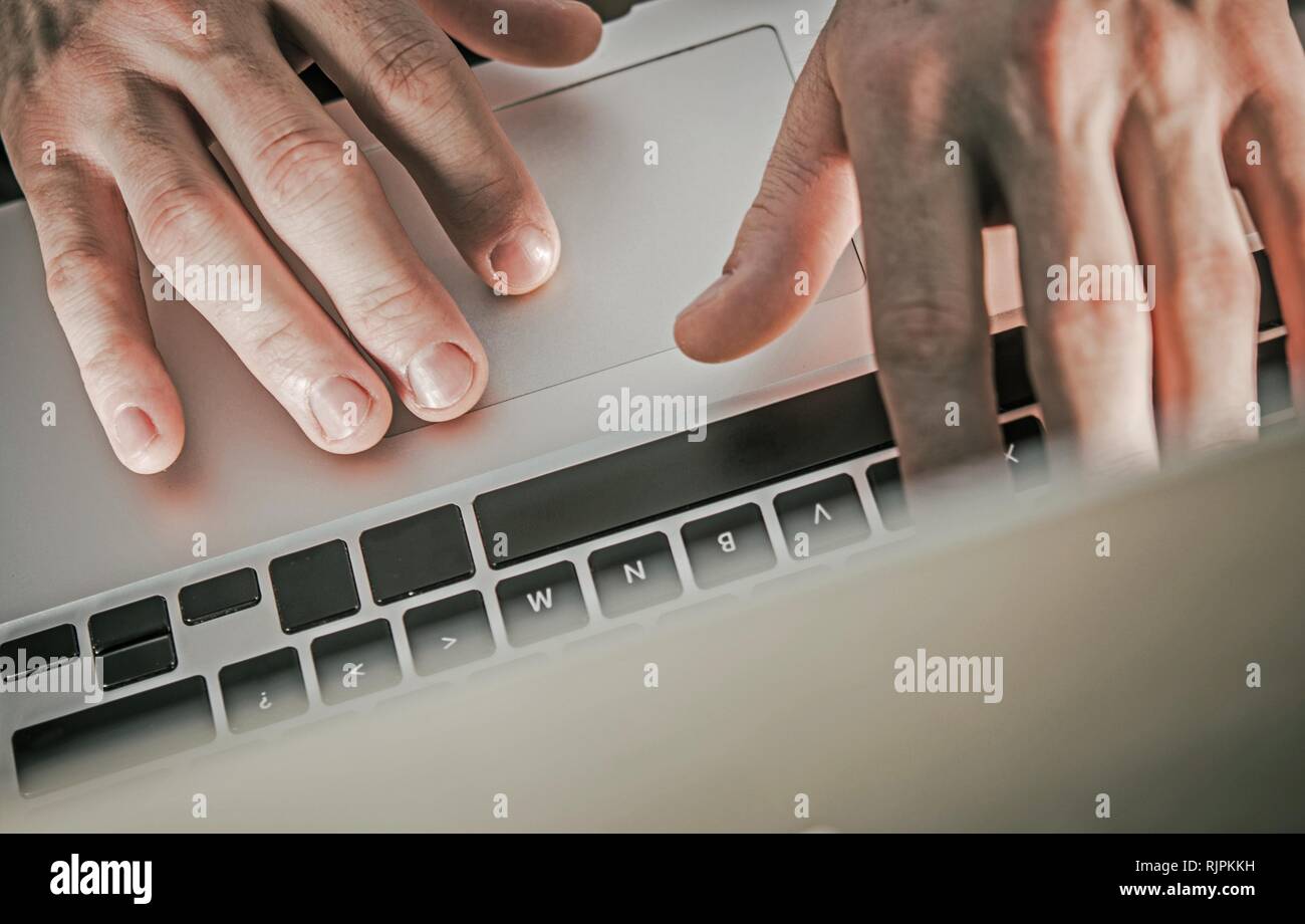 Caucasian Corporate Worker and His Work Using Laptop Computer. Top View ...