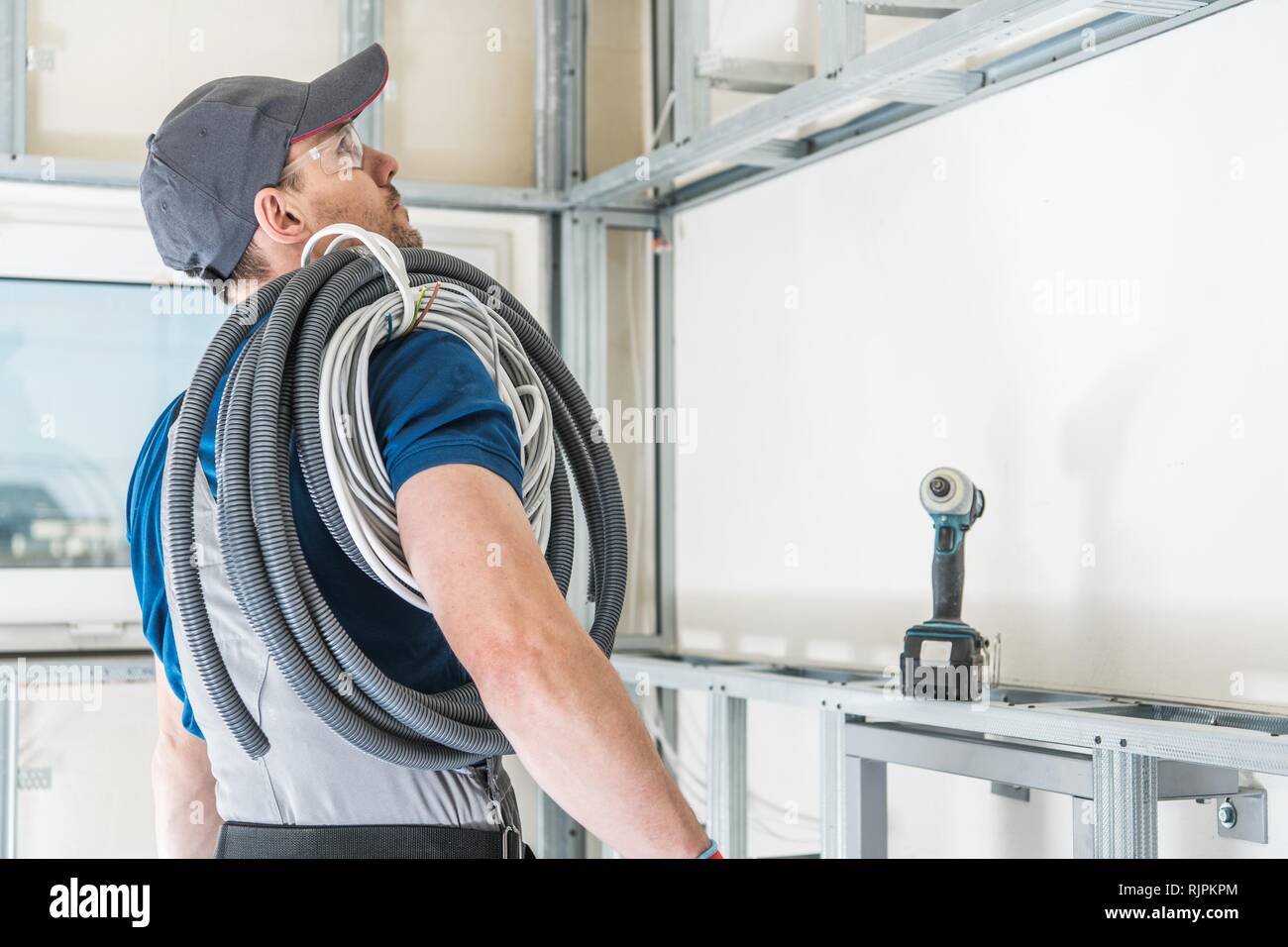 Electrician Ready For Work. Caucasian Electric Worker in His 30s with ...
