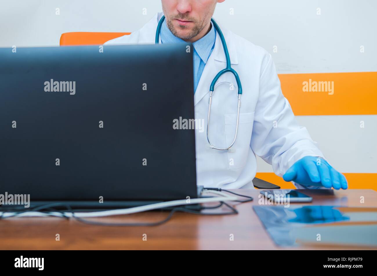 Medical Doctor Office Work. Caucasian Healthcare Worker in His 30s in ...