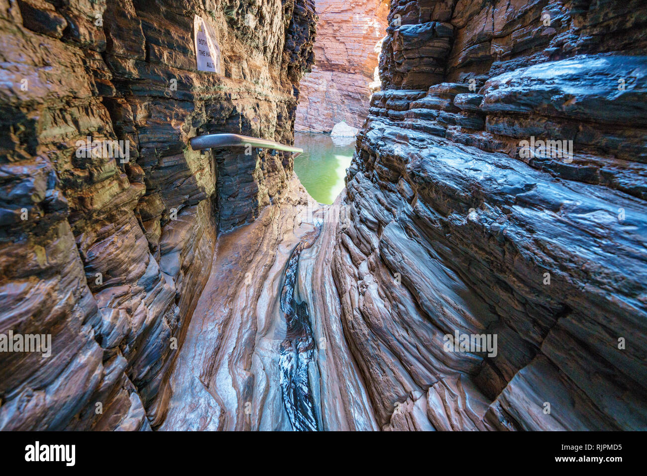 hiking to handrail pool in the weano gorge in karijini national park ...