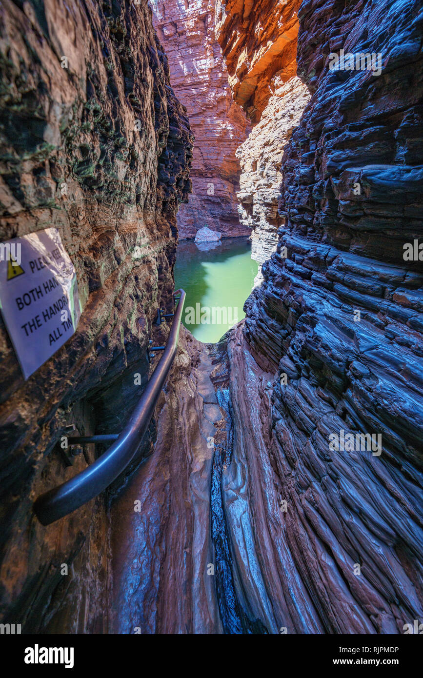 hiking to handrail pool in the weano gorge in karijini national park ...