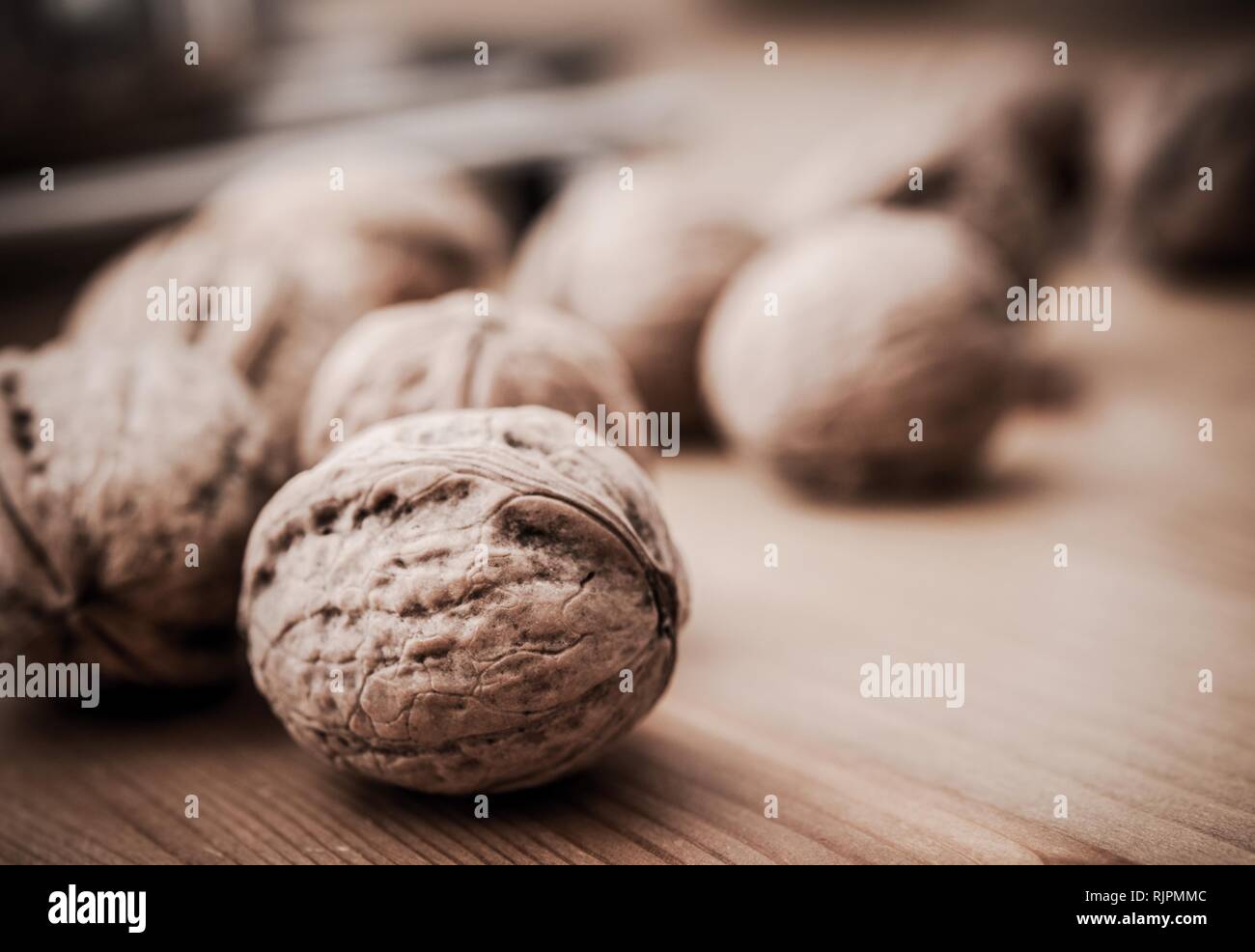 Organic Walnuts on Wood Table. Tree of the Genus Juglans Seed. Healthy ...