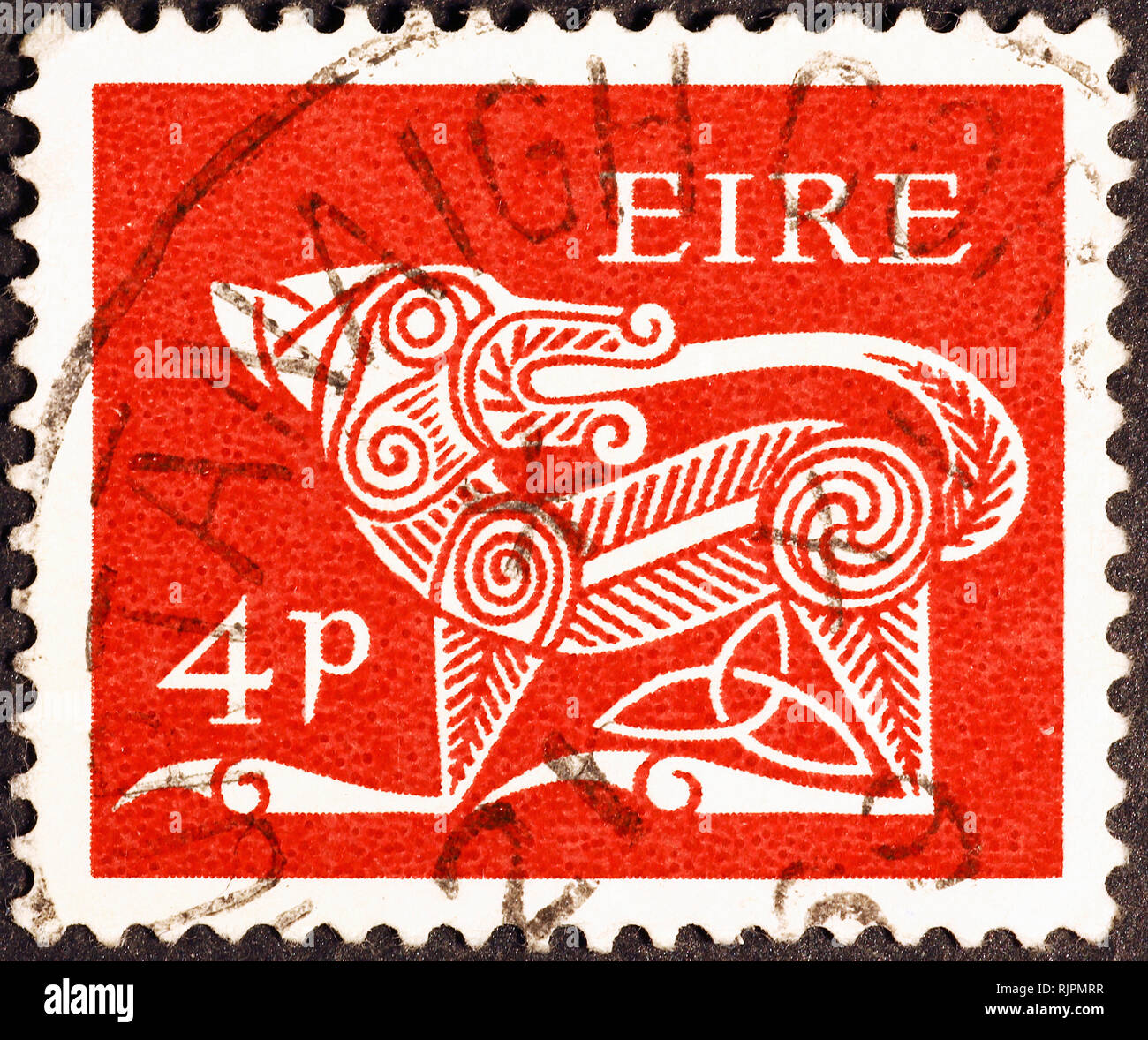 Celtic drawing on red irish postage stamp Stock Photo - Alamy