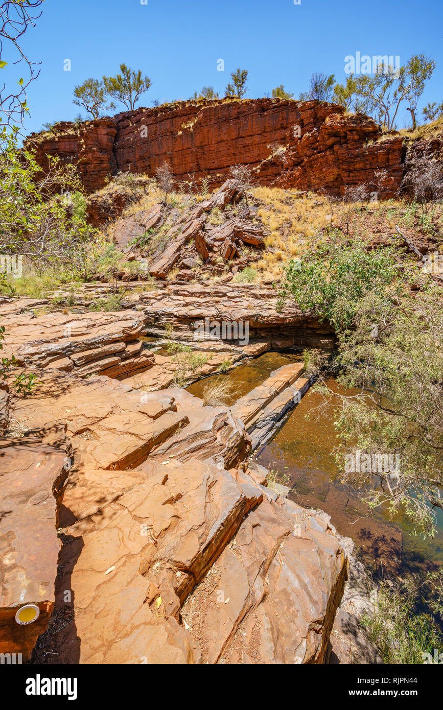 hiking down in the deep and narrow weano gorge in karijini national ...