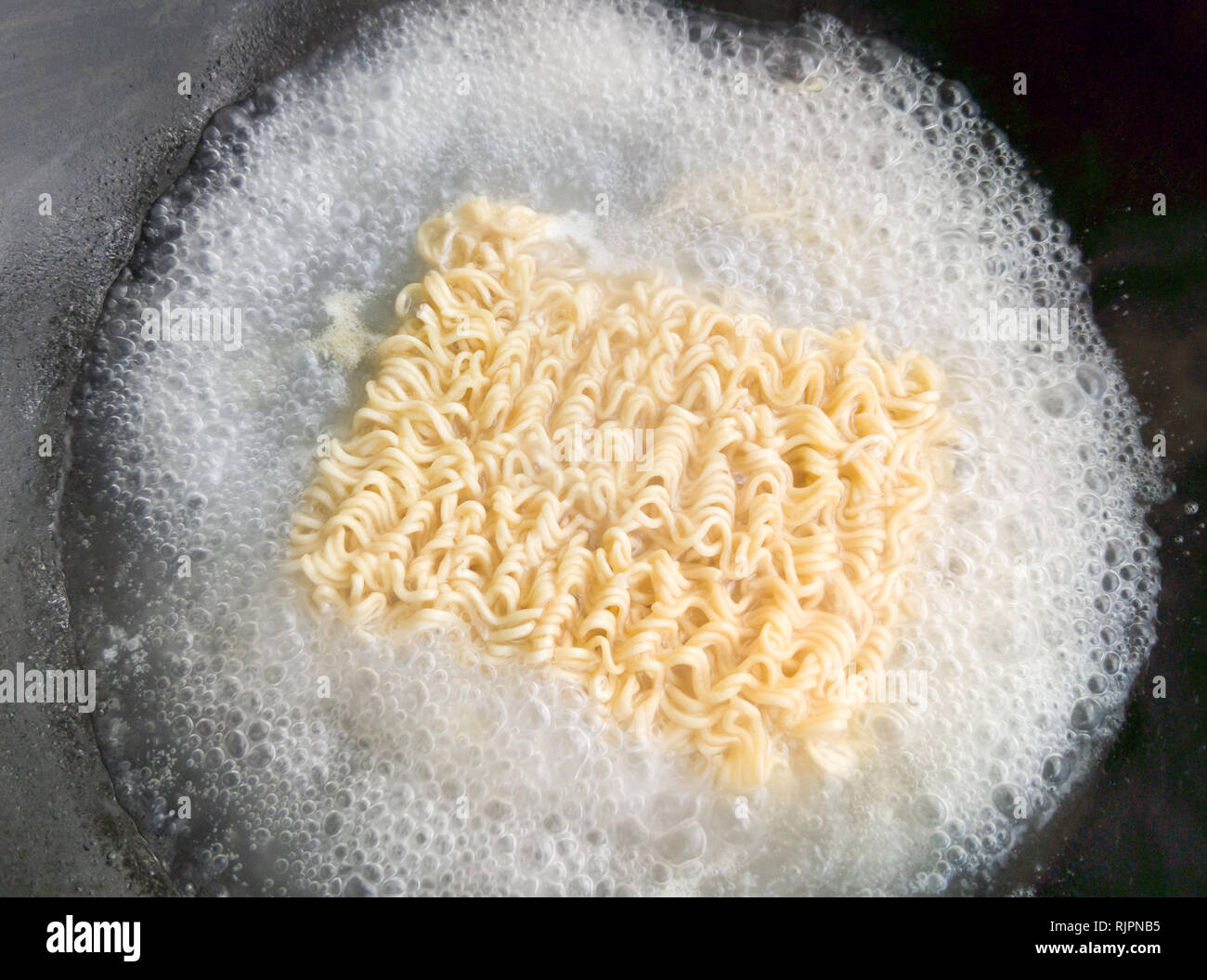 Instant noodles boiling in pan hi-res stock photography and images - Alamy