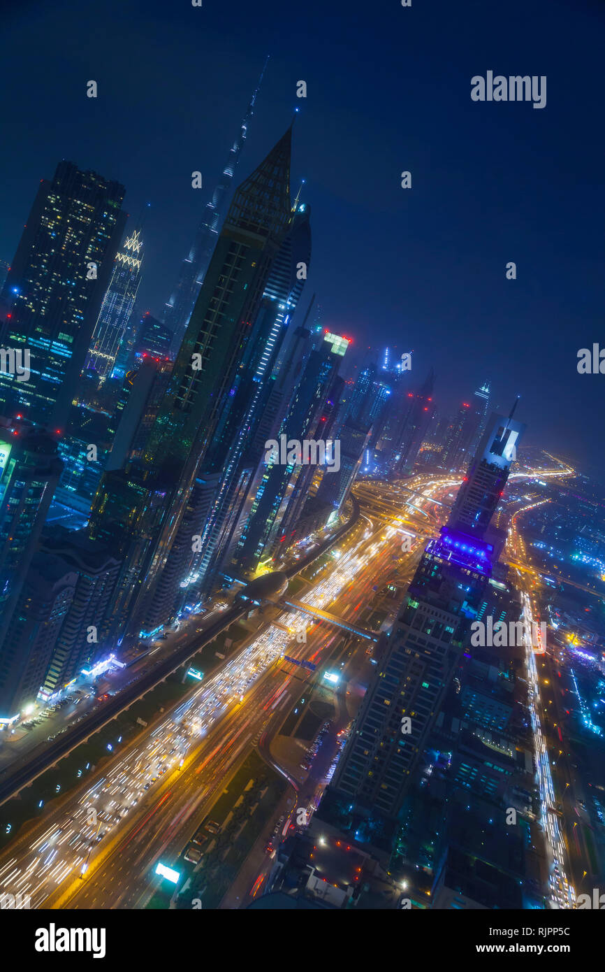 Skyscrapers along Sheikh Zayed Road at evening rush hour, Dubai, UAE ...