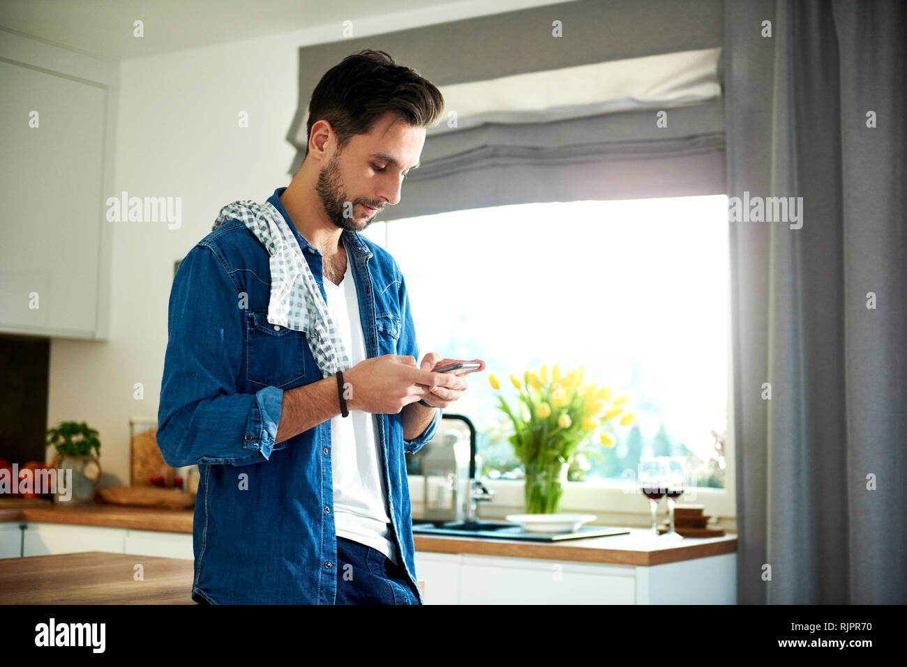 Kitchen looking man young man male white male hi-res stock photography ...