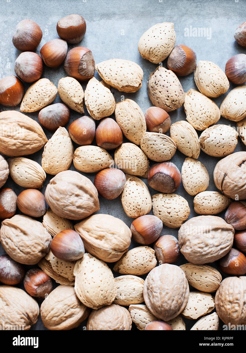 Walnuts and almonds in shell, hazelnuts Stock Photo - Alamy