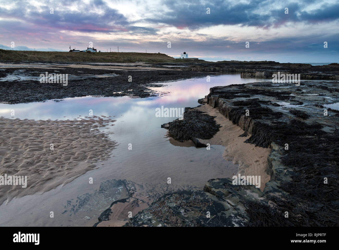 Bamburgh Castle & beach Stock Photo - Alamy