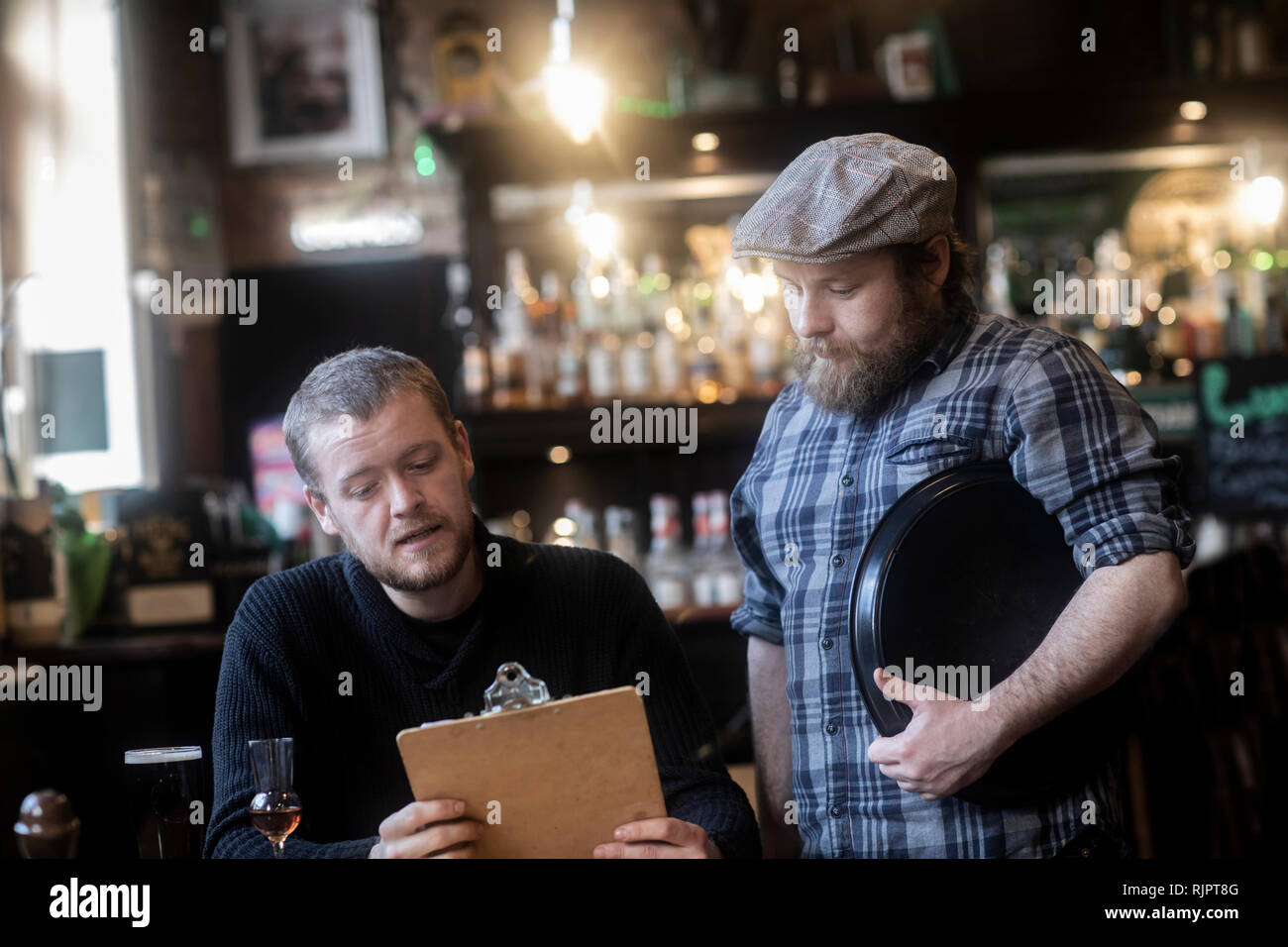 Menu and customer hi-res stock photography and images - Alamy