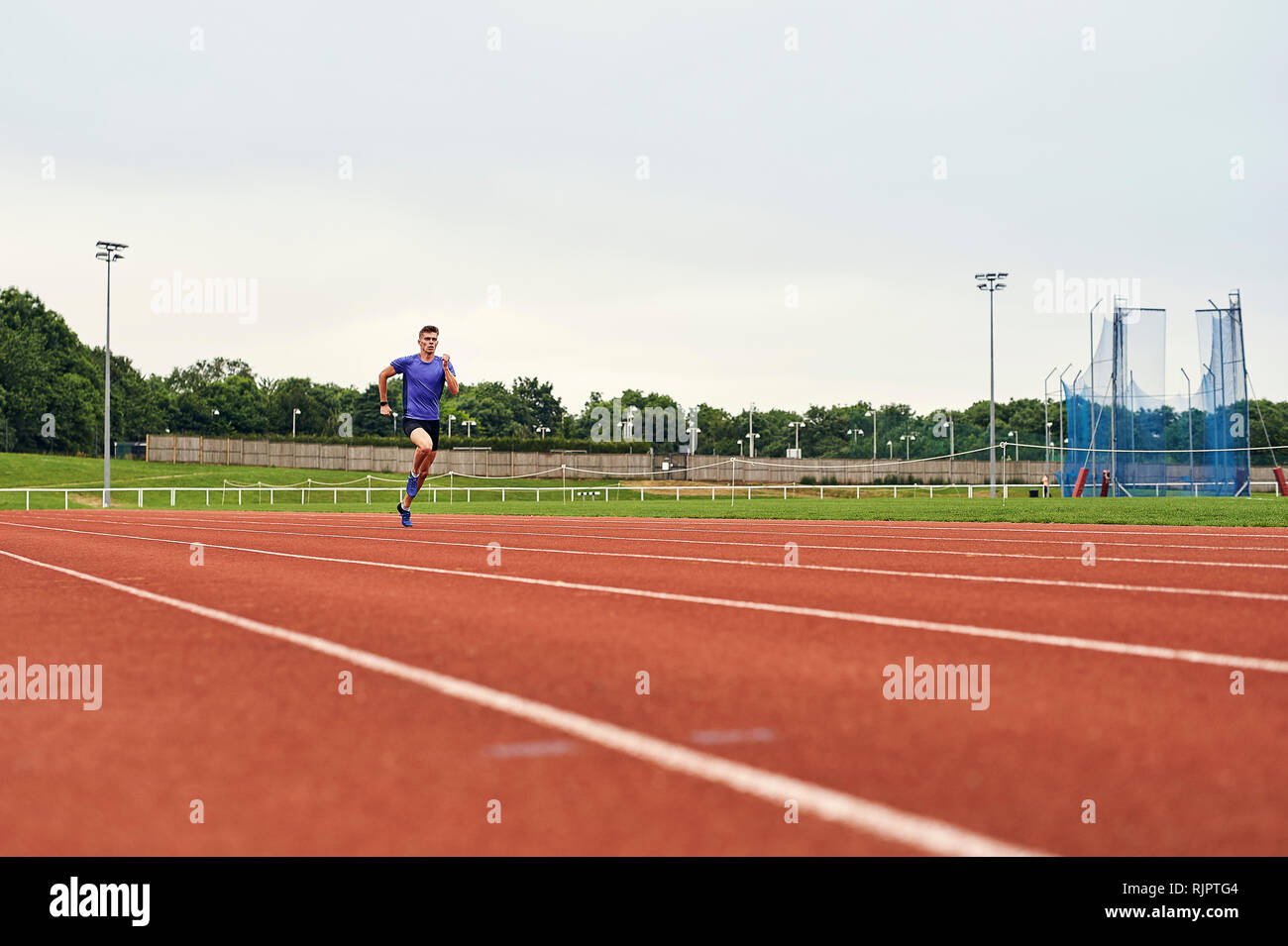 Training track runner hi-res stock photography and images - Alamy