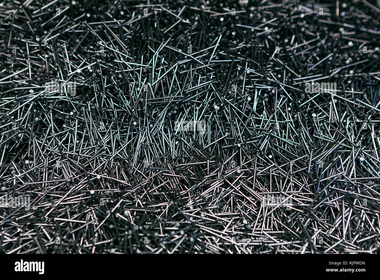 Metal steel nails texture construction background Stock Photo - Alamy