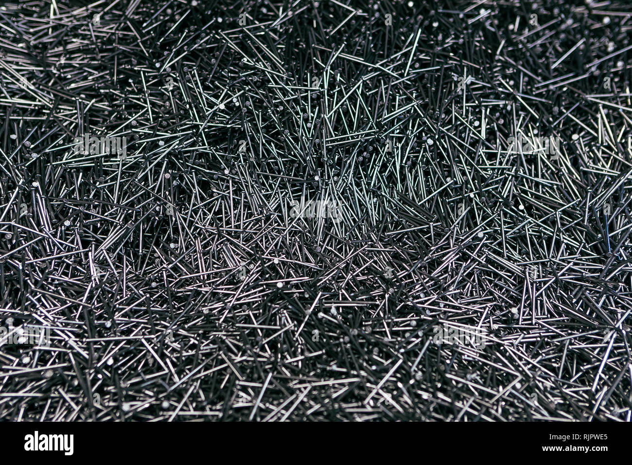Metal steel nails texture construction background Stock Photo - Alamy