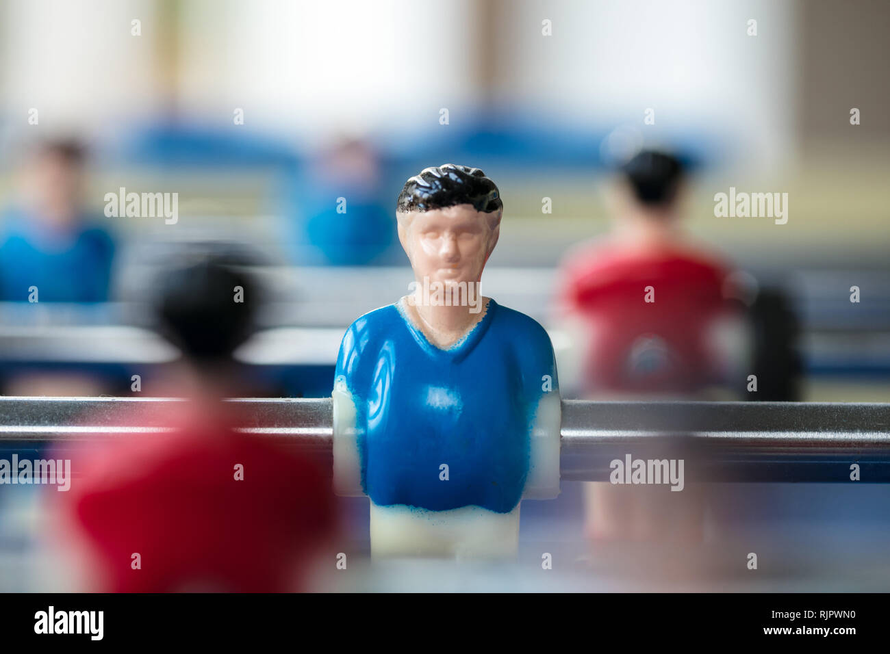 Figure of footballer on table football Stock Photo - Alamy