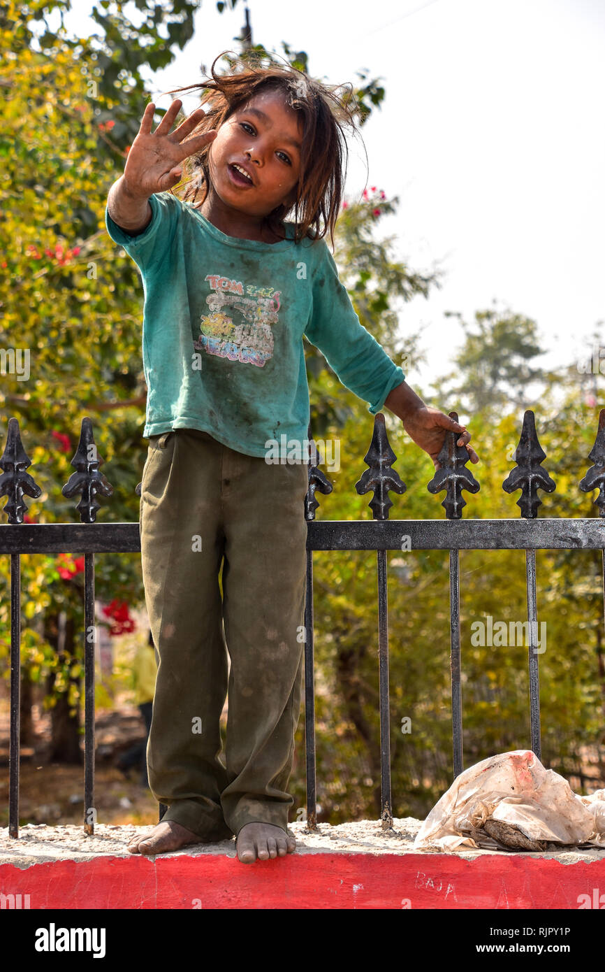Boy street urchin, Playing, Waving, Bund Stock Photo - Alamy