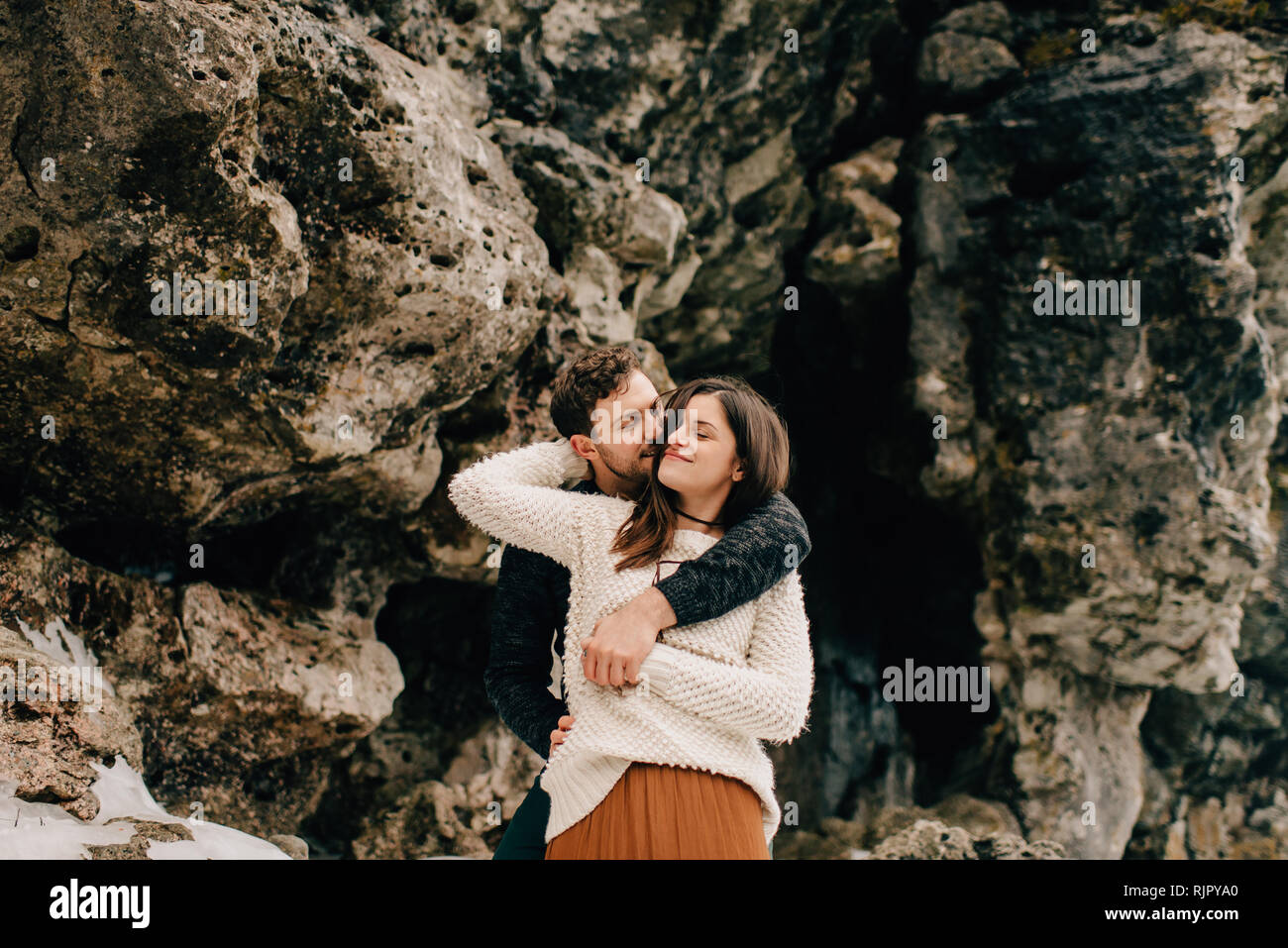 Couple hugging beside rock face, Tobermory, Canada Stock Photo - Alamy