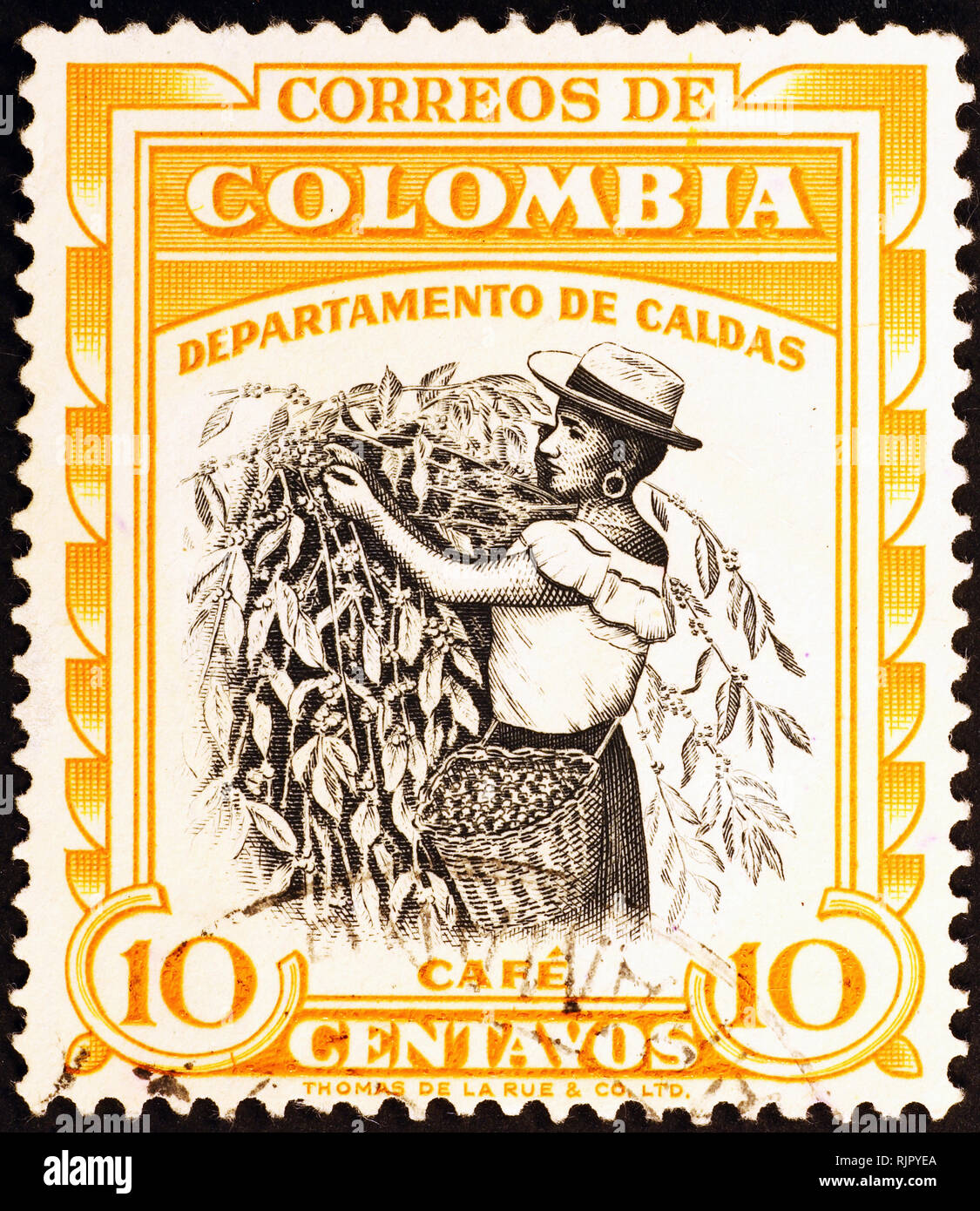 Coffee picker on colombian postage stamp Stock Photo - Alamy