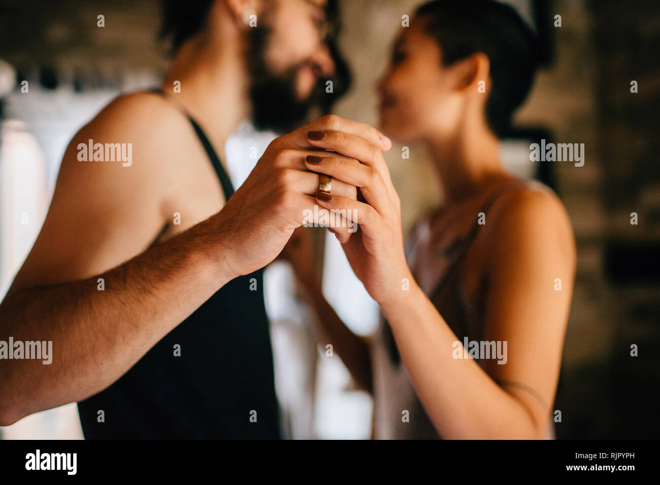 Couple slow dancing at home Stock Photo - Alamy