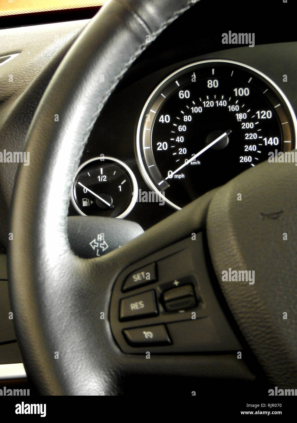 Vehicle dashboard and interface of cruise control on the steering wheel ...