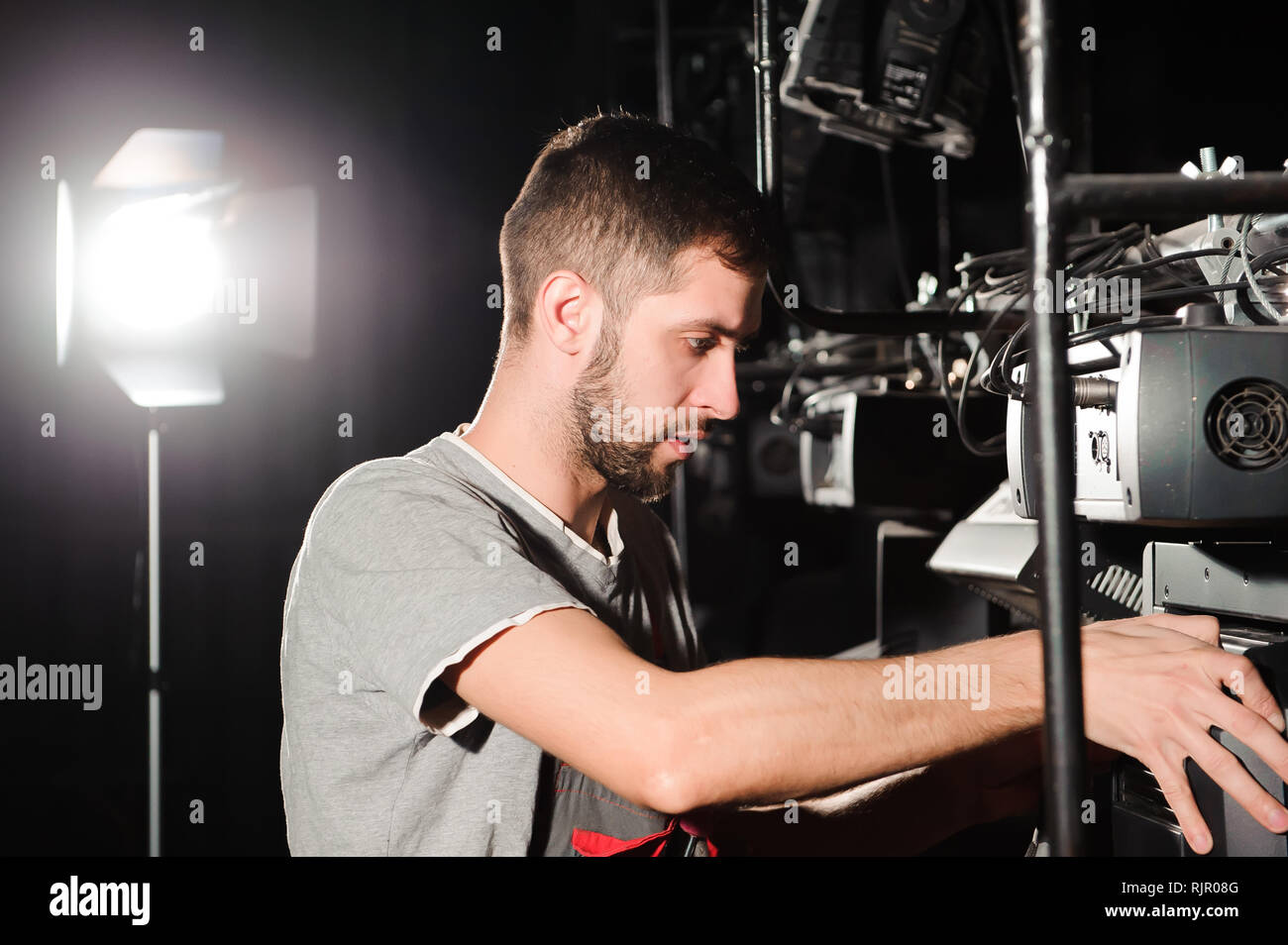 The lighting engineer adjusts the lights on the stage Stock Photo - Alamy