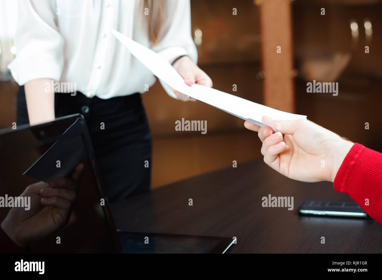 Business office team passing documents hi-res stock photography and ...