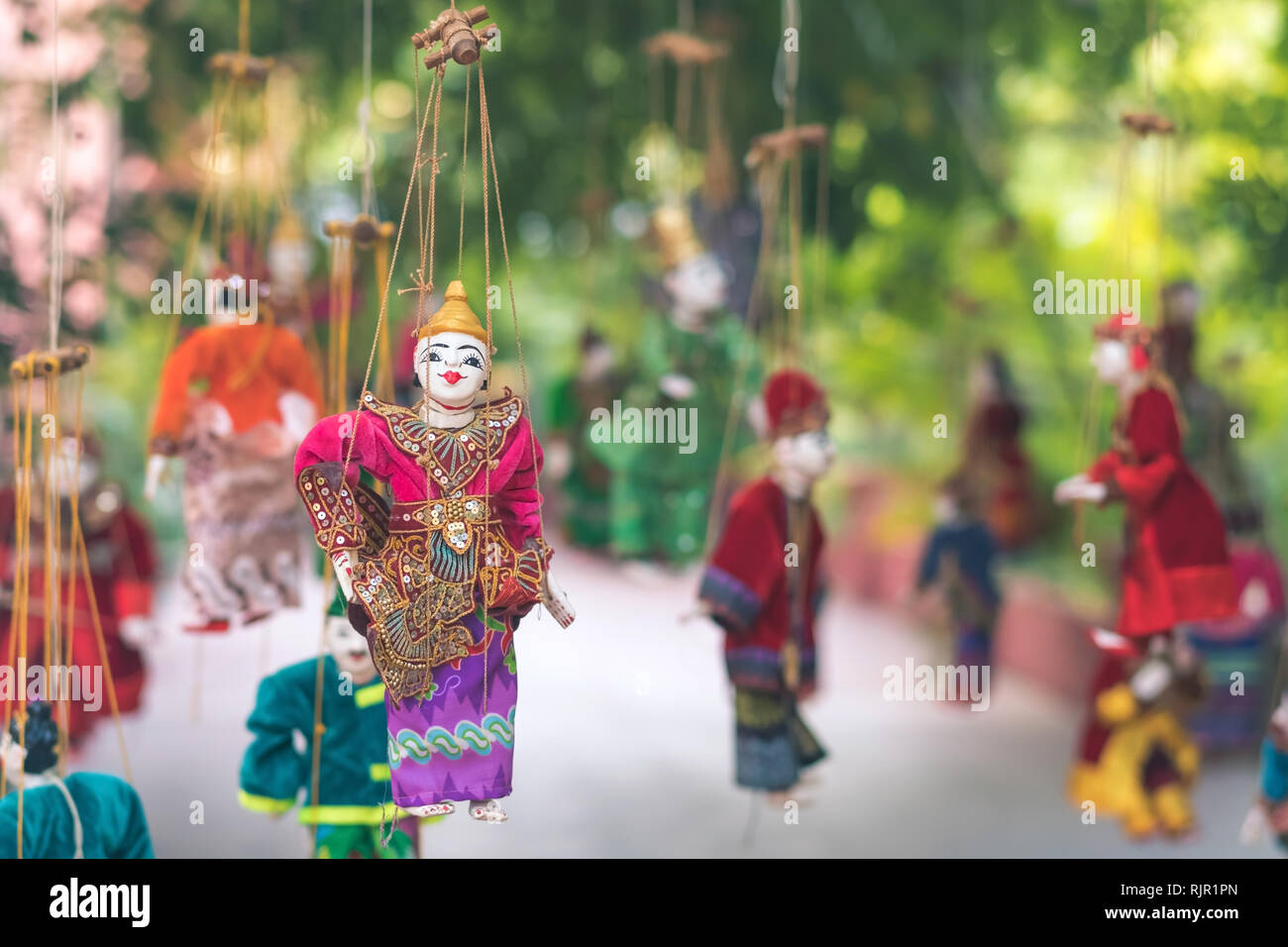Traditional handicraft puppets for sale in the ancient pagoda in Bagan ...