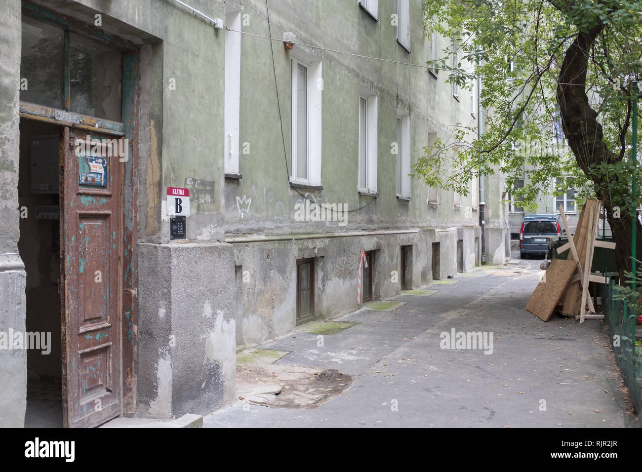 the outside of a tenement building with door ajar Stock Photo - Alamy