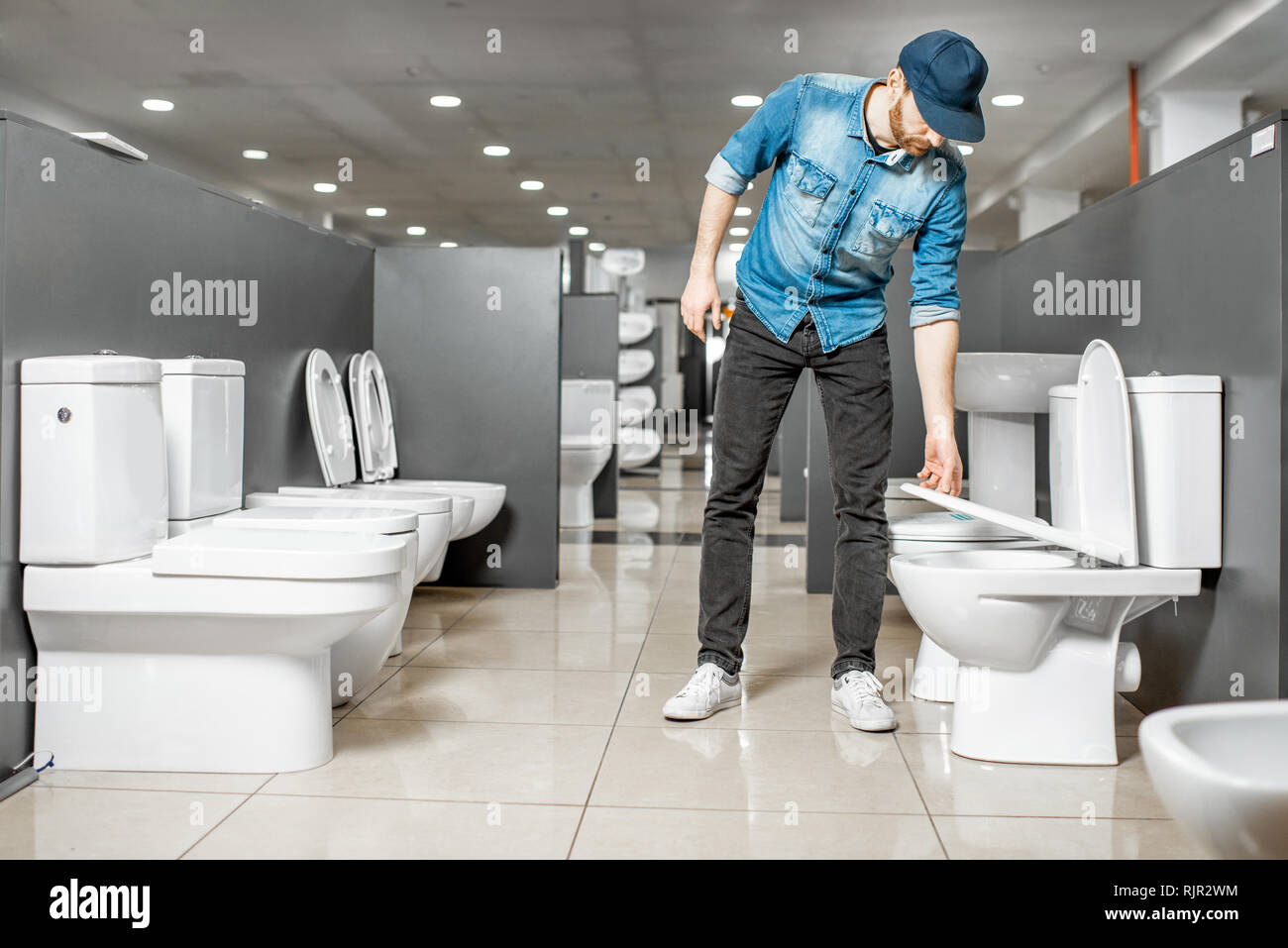 Man standing toilet hi-res stock photography and images - Alamy