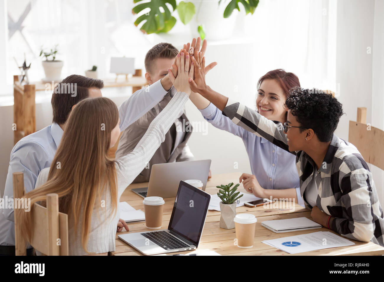 Celebration high five teammates hi-res stock photography and images - Alamy