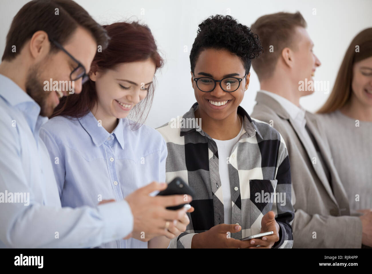 Multiethnic friends having video hi-res stock photography and images ...