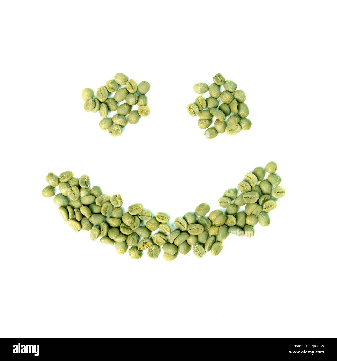 smile from green coffee beans on white background top view Stock Photo ...