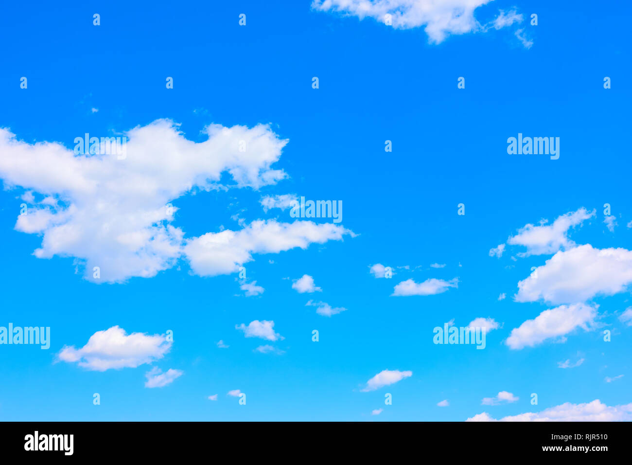Blue spring sky with white clouds Stock Photo - Alamy