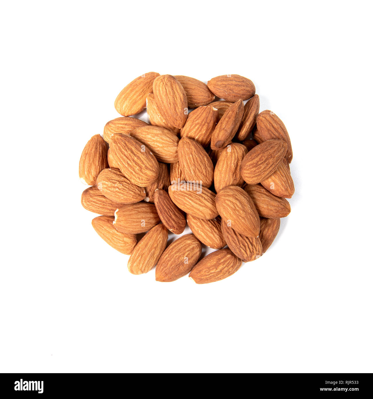 Pile of almonds isolated on white, top view Stock Photo - Alamy