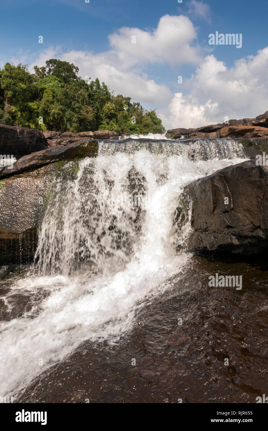 Cambodia, Koh Kong Province, Tatai, Waterfall, water flowing over edge ...
