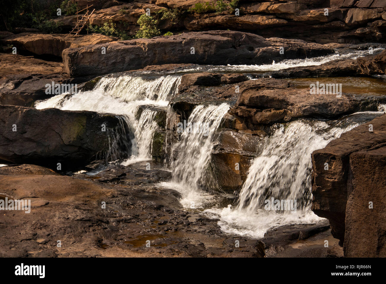 Cambodia, Koh Kong Province, Tatai, Waterfall, water flowing over falls ...