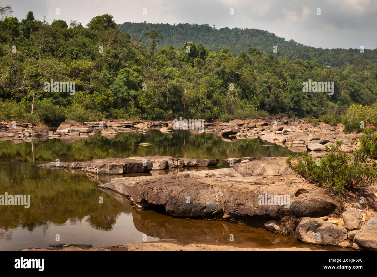 Cambodia, Koh Kong Province, Tatai, Waterfall, reflections in calm ...
