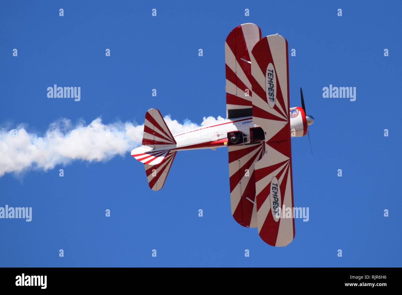 A flight demonstration propeller driven biplane has a surprise in store ...