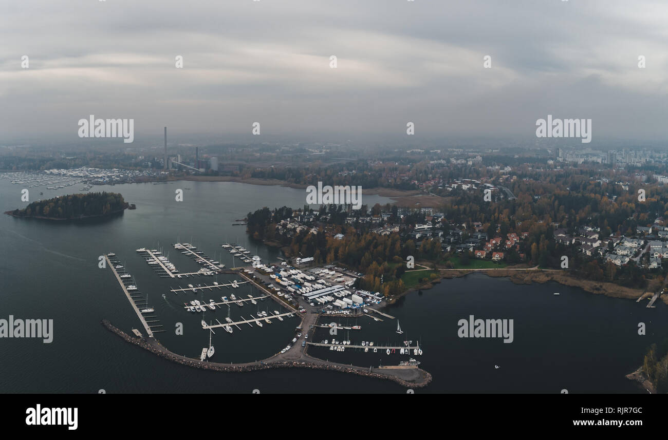 Nuottaniemi marina seen from air on a foggy and moody autumn day, Espoo ...