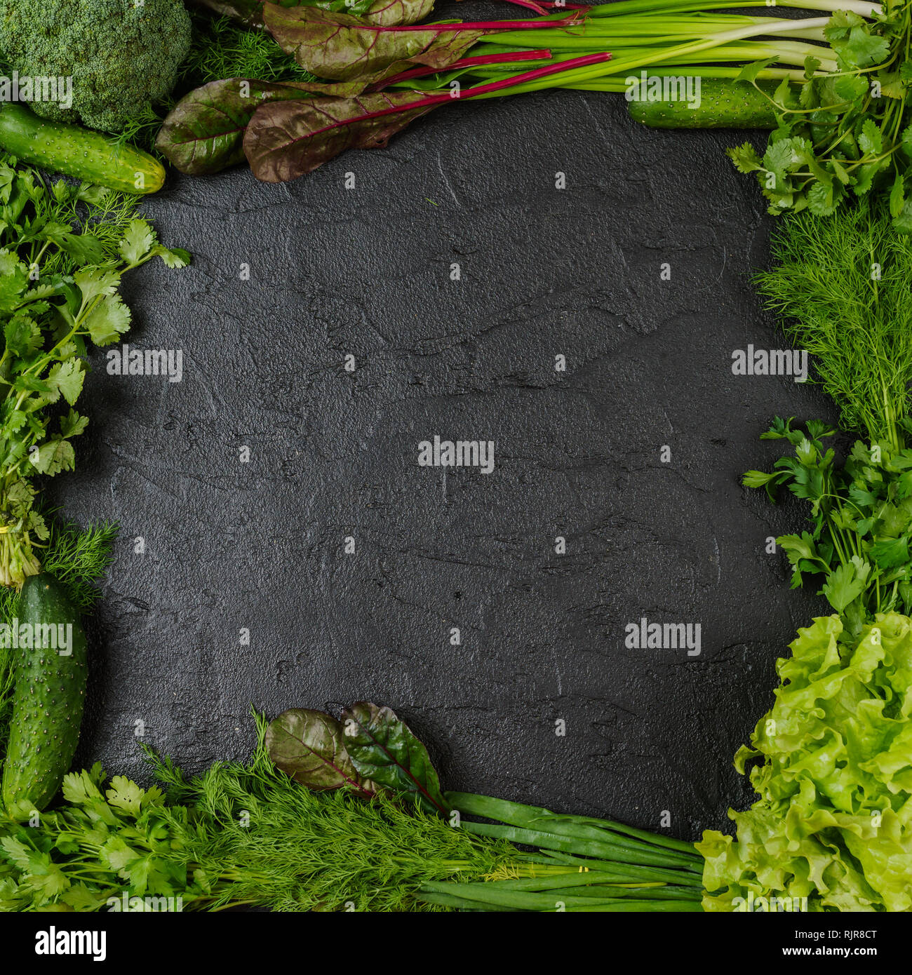 assorted green vegetables on black Stock Photo - Alamy