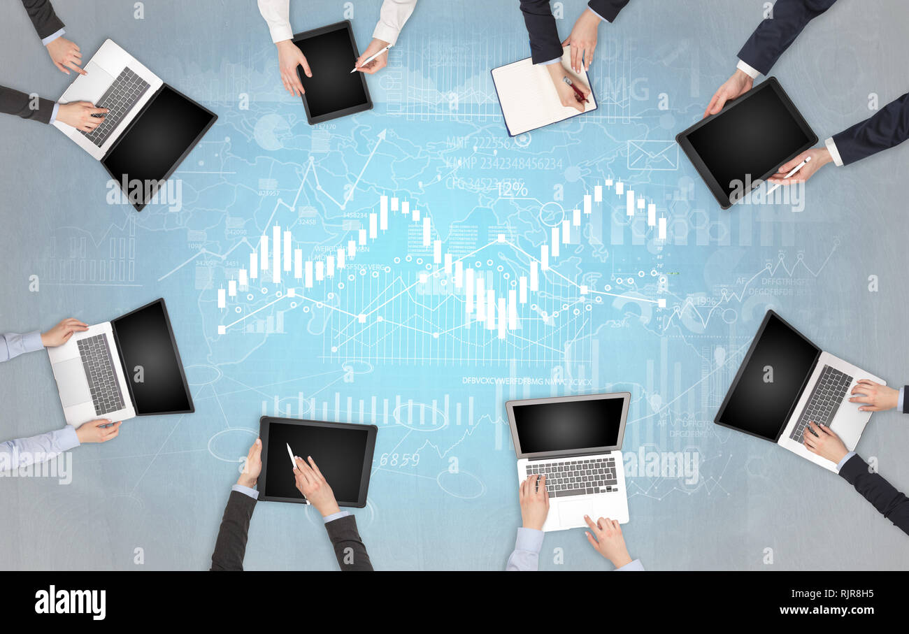 Group of people with devices in hands teamworking on laptops, tablets ...